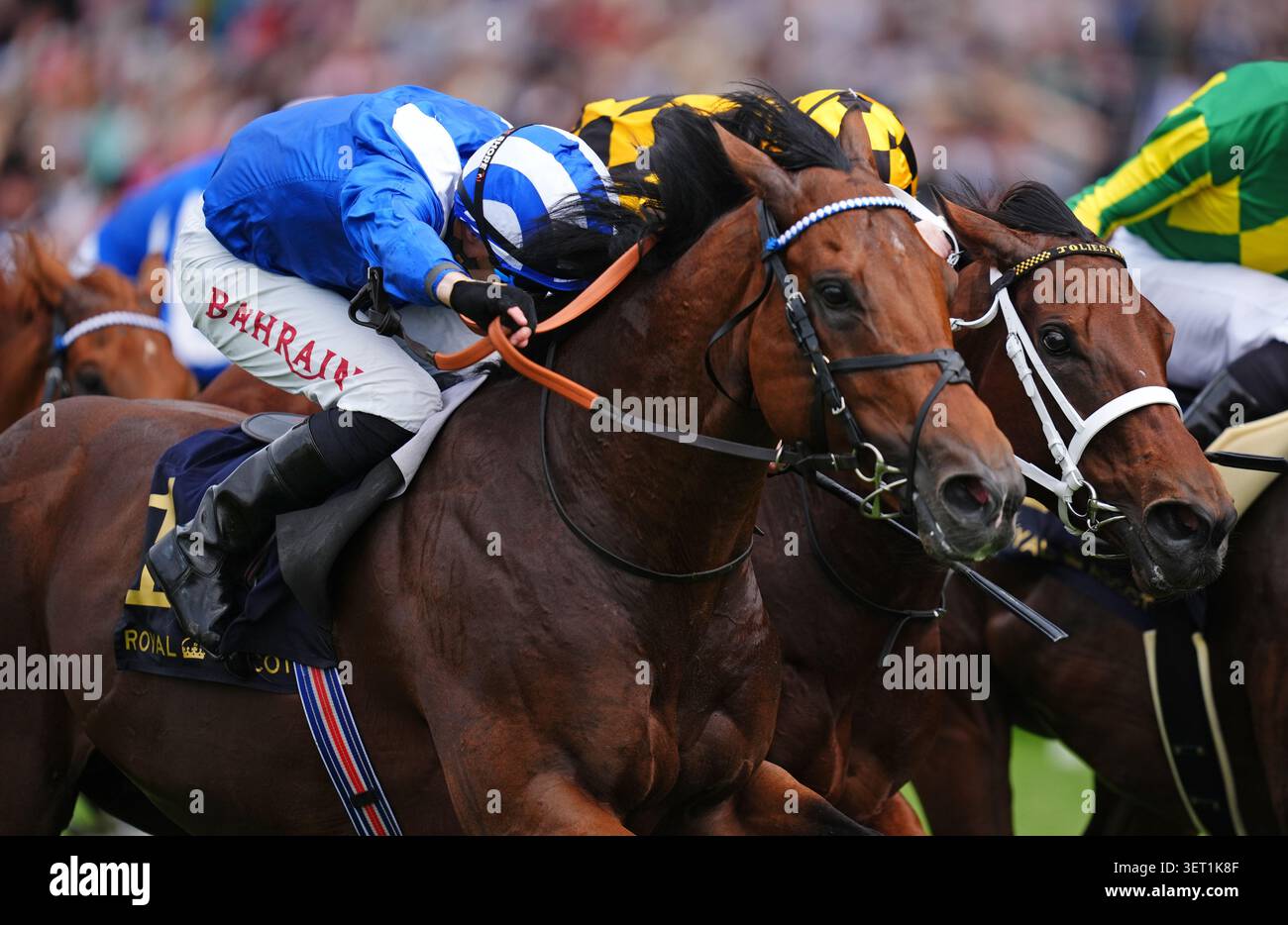Almeraq ridden by Tom Marquand (left) wins the Queen Elizabeth II ...