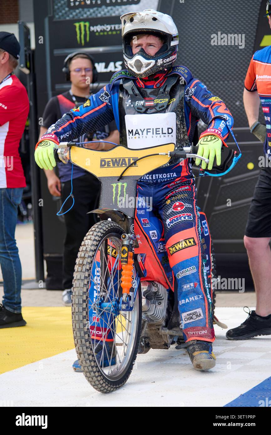 Andrzej Lebiediev of Latvia #29 waits in the pits ahead of the Sprint ...