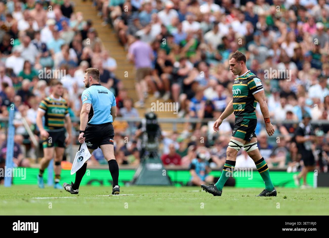Northampton Saints' Josh Kemeny leaves the field after being shown a ...