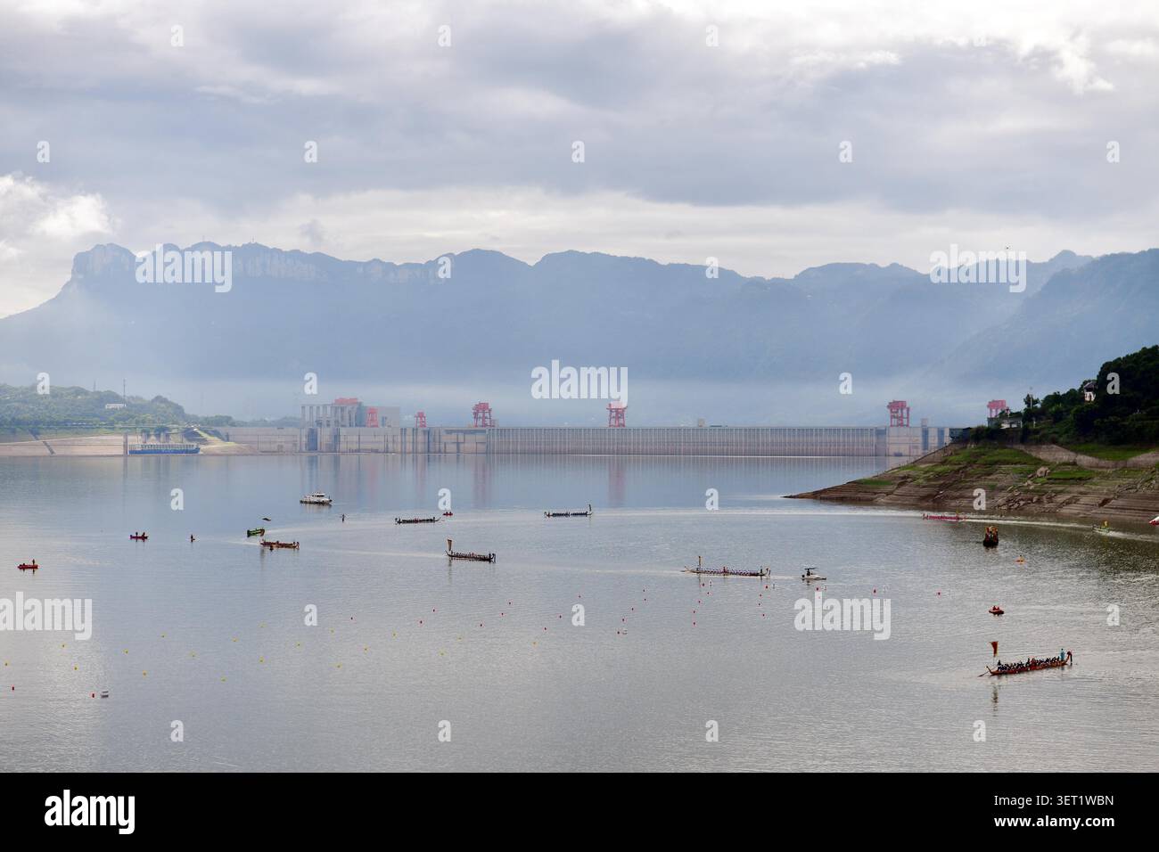 Dragon boat teams perform a soul-summoning ritual on the river during ...