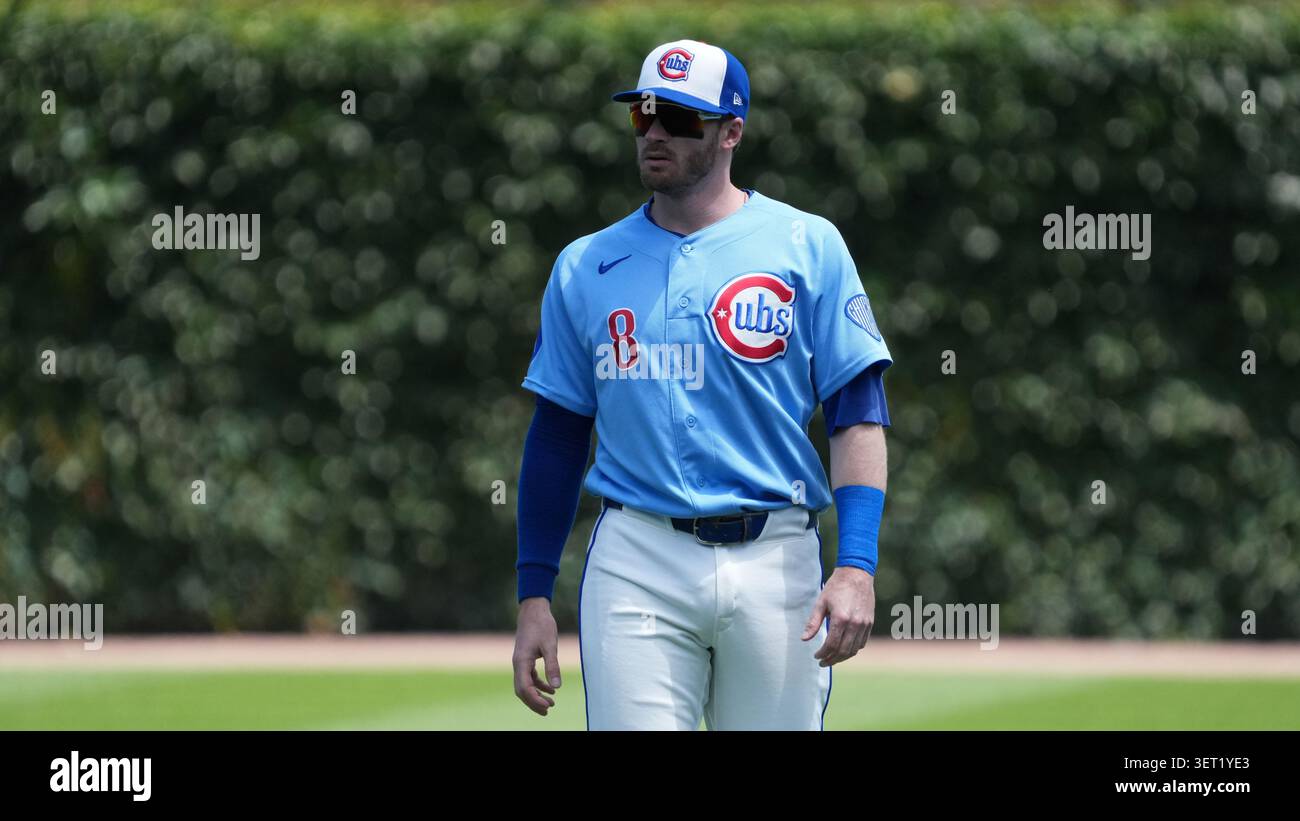 Chicago Cubs' Ian Happ warms up before a baseball game against the ...
