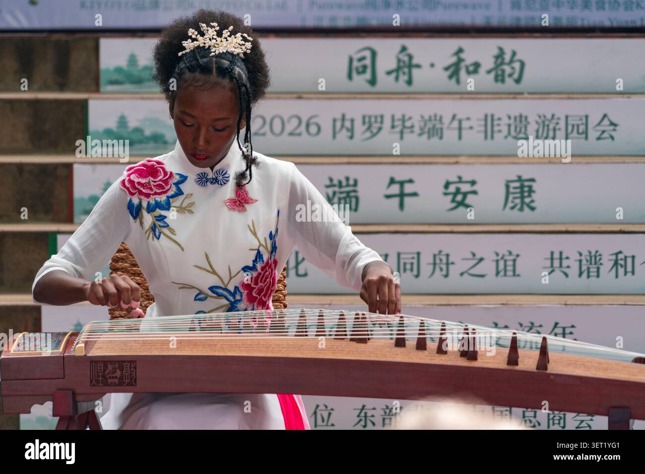 (260620) -- NAIROBI, June 20, 2026 (Xinhua) -- A participant plays ...