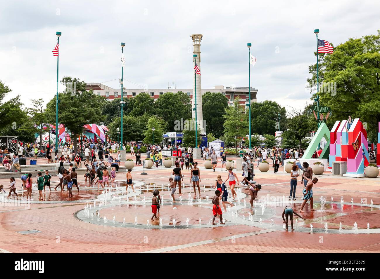 Kids play in the fountains inside the FIFA Fan Festival at Centennial ...