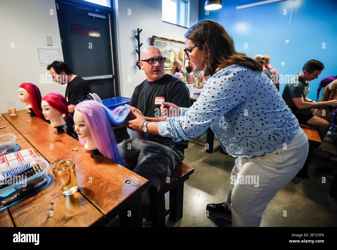 Ren Cherlet instructs Caleb and other fathers as they participate in ...