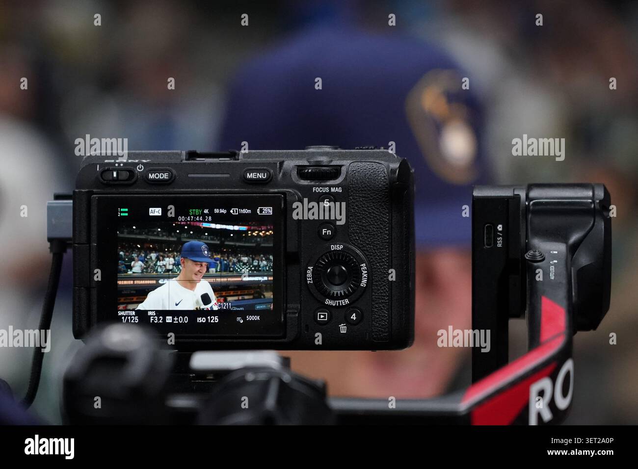 Milwaukee Brewers' Cooper Pratt gets interviewed after a baseball game ...