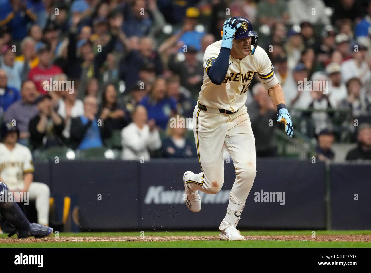 Milwaukee Brewers' Cooper Pratt runs to first base during a baseball ...