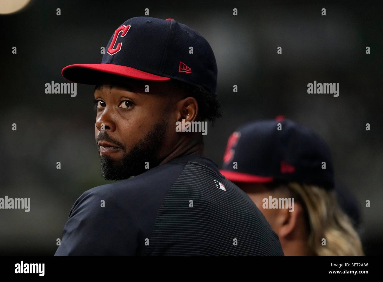 Cleveland Guardians' Kahlil Watson looks on before a baseball game ...