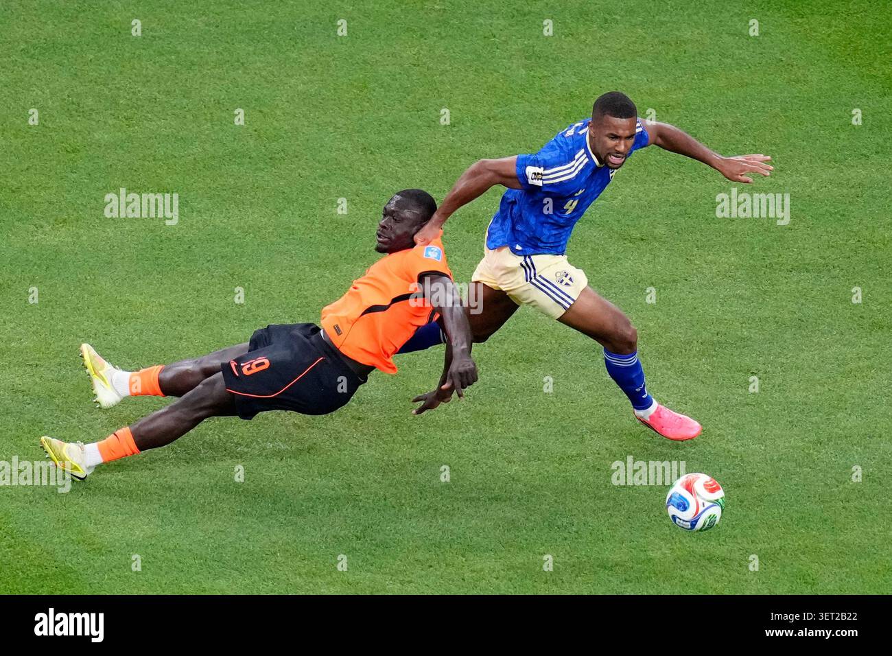 Netherlands' Brian Brobbey, left, is fouled by Sweden's Isak Hien ...