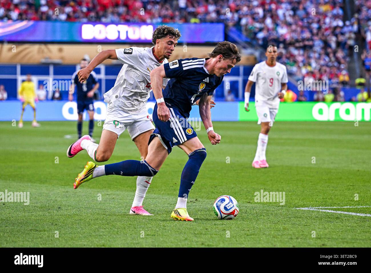 Morocco's Neil EL AYNAOUI and Scotland's Scott McTOMINAY during the ...
