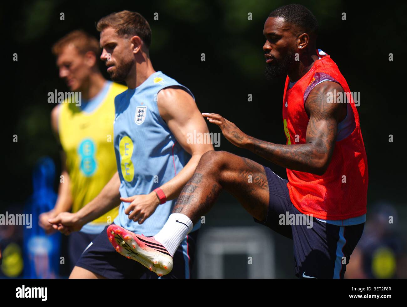 England's Jordan Henderson (left) and Ivan Toney during a training ...