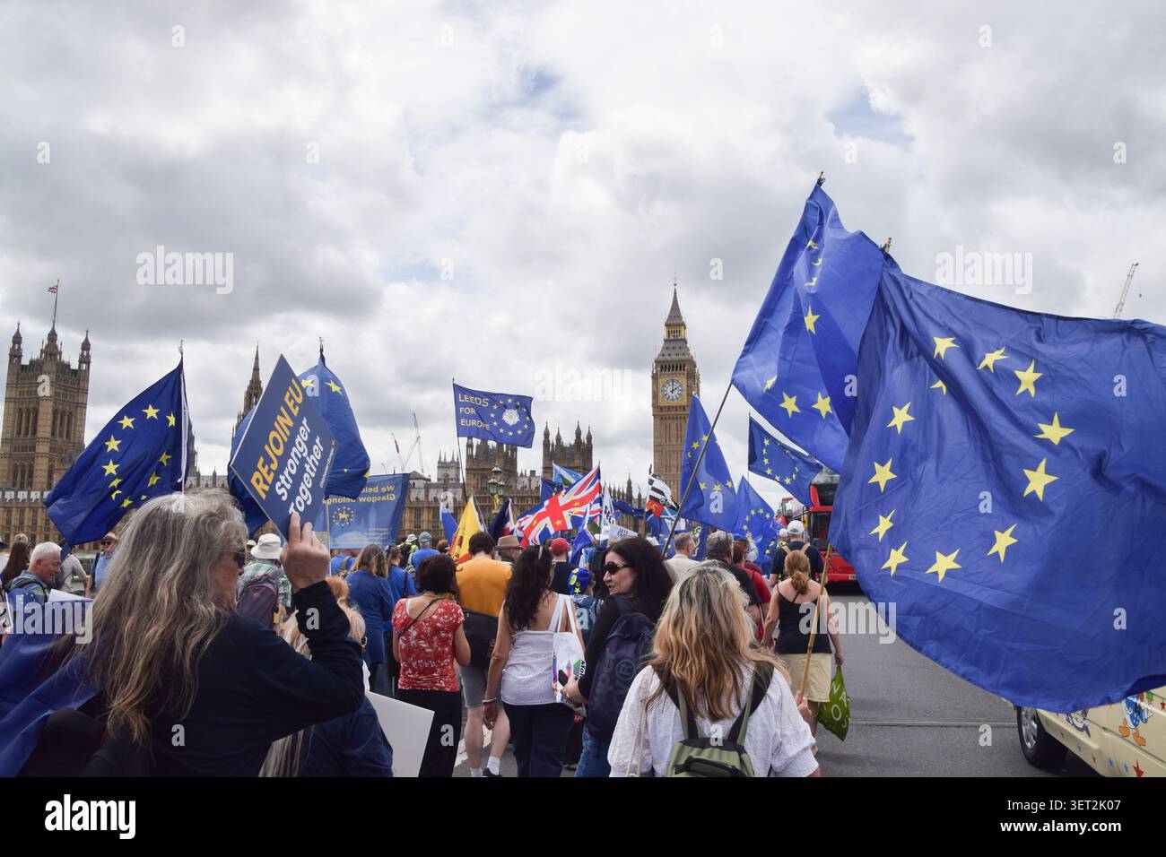 Protesters pass across Westminster Bridge with EU flags during the ...