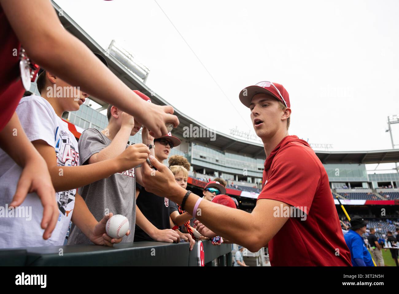 Oklahoma's Alec Blair (4) signs autographs for fans before playing ...