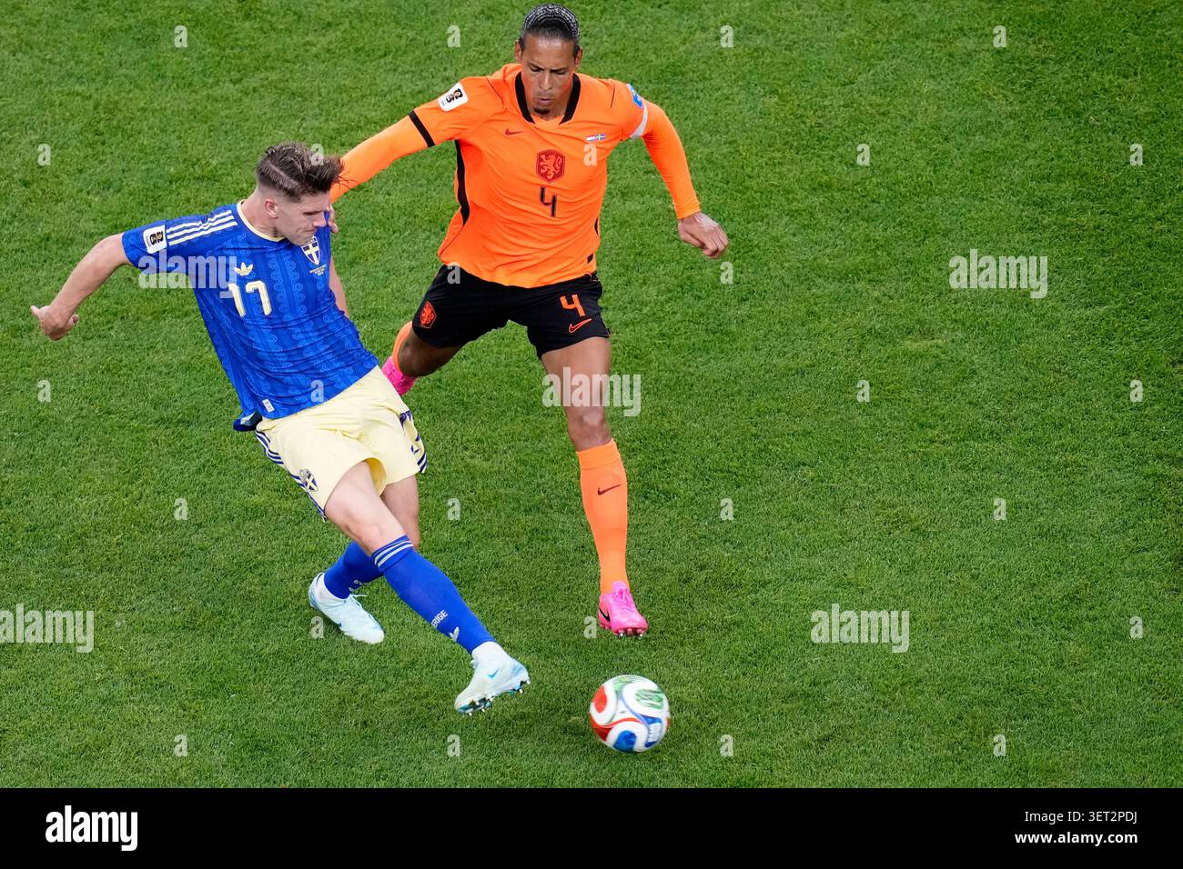 Sweden's Viktor Gyokeres, left, and Netherlands' Virgil van Dijk battle ...