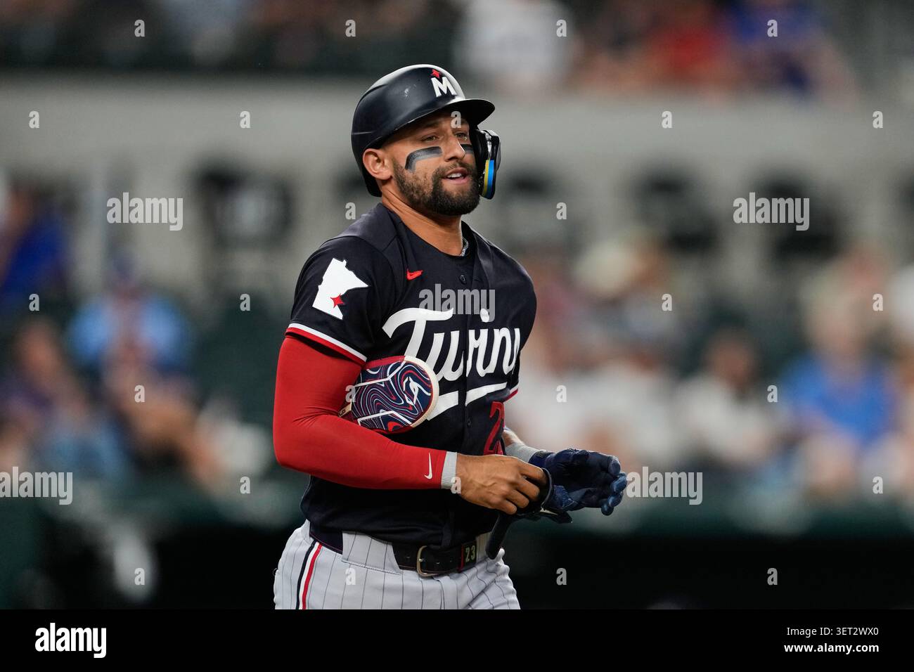 Minnesota Twins' Royce Lewis jogs to first after earning a walk during ...