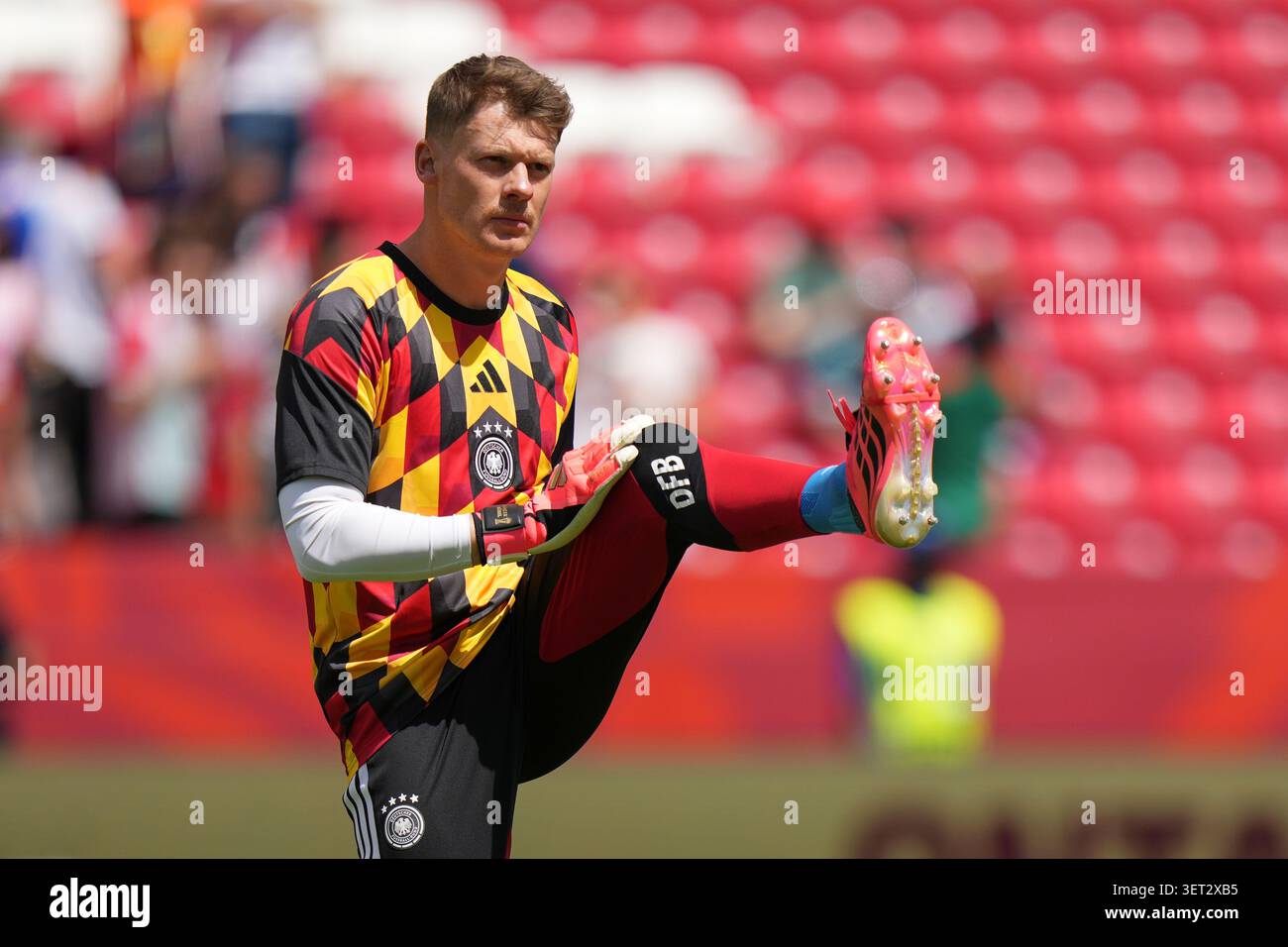 Germany goalkeeper Alexander Nuebel, takes part in the warm up head of ...