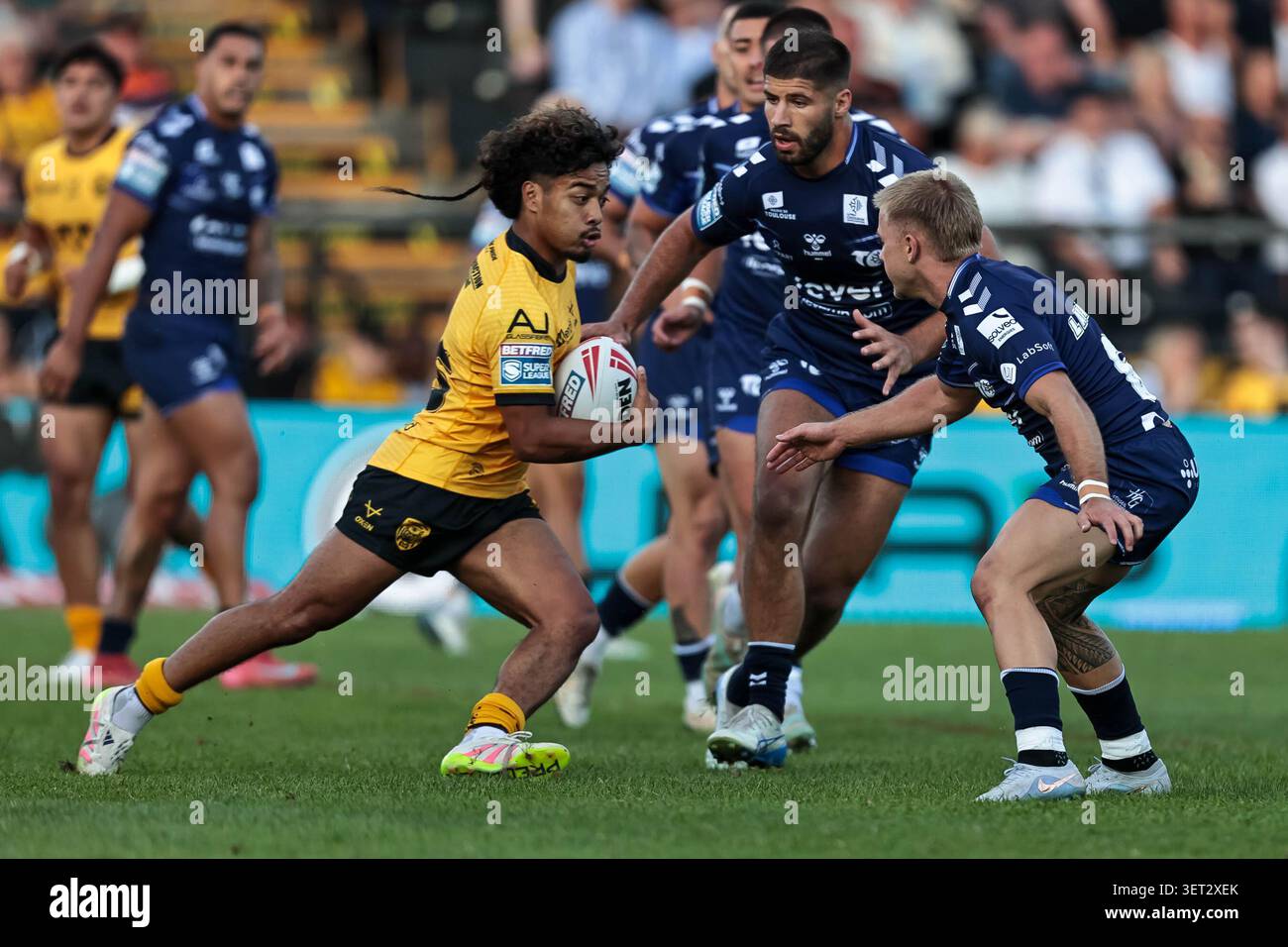 Phoenix Laulu Togaga’e runs at the Toulouse defence during the BetFred ...