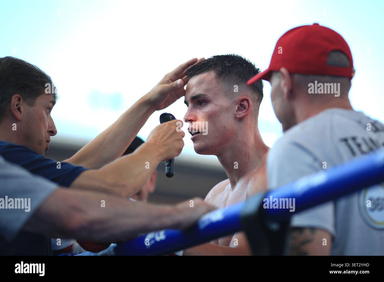 Taylor Bevan is checked by the medical staff after the super ...
