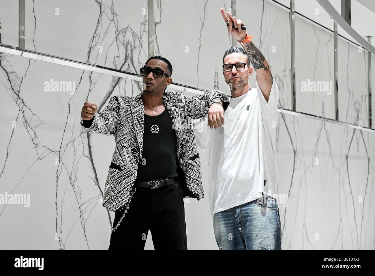 Egyptian actor and singer Mohamed Ramadan, left, appears with designer ...