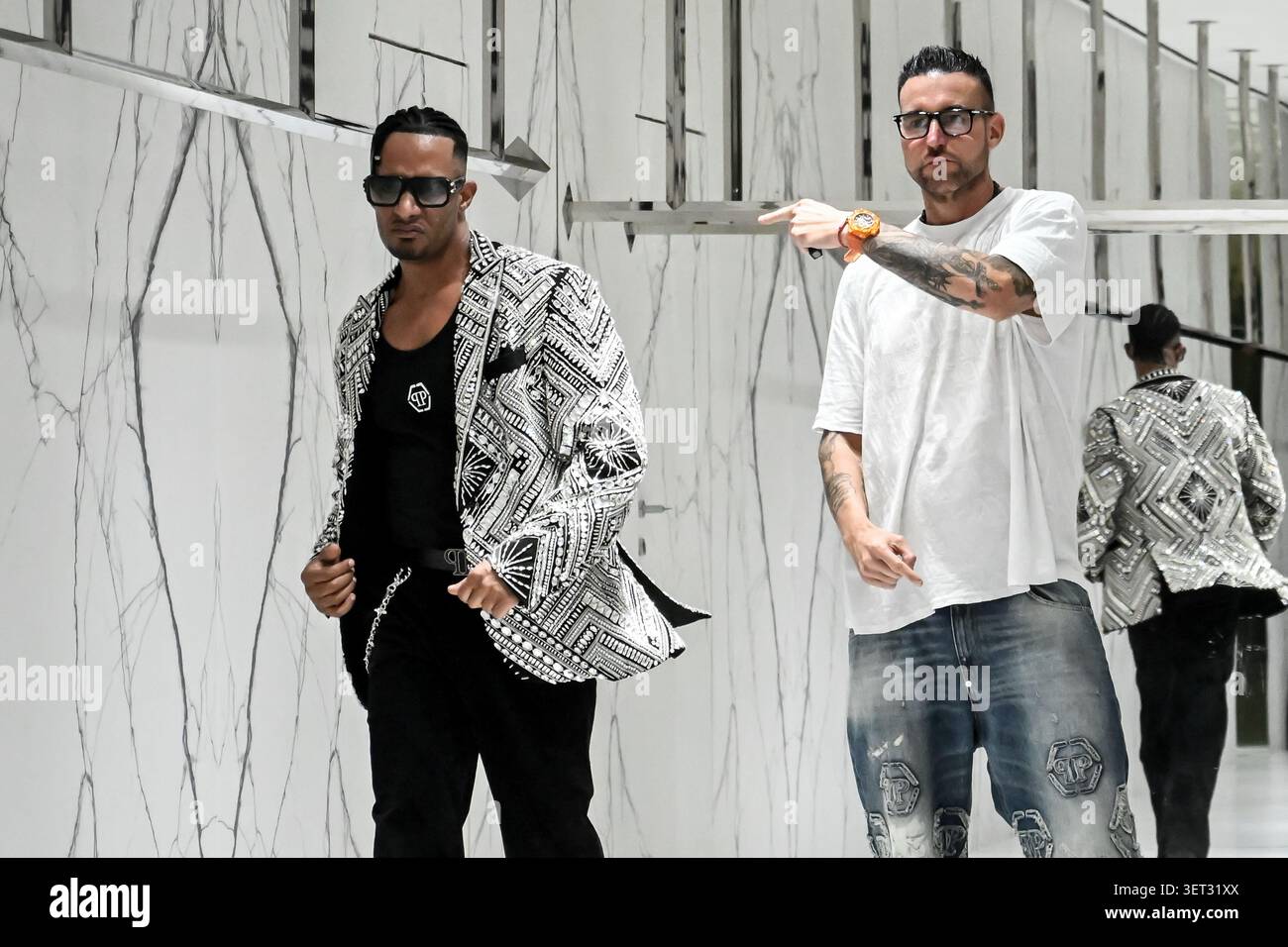 Egyptian actor and singer Mohamed Ramadan, left, appears with designer ...