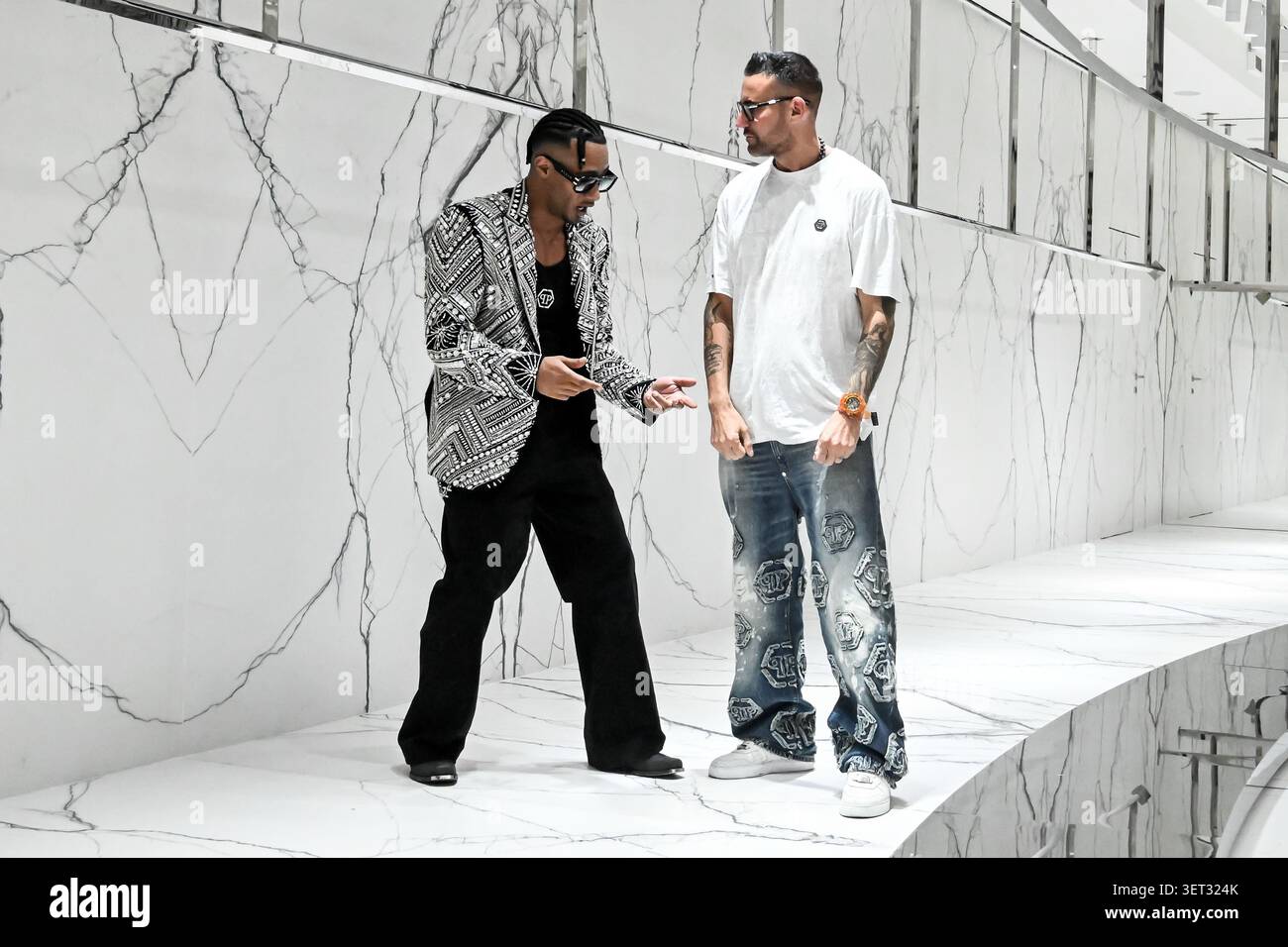 Egyptian actor and singer Mohamed Ramadan, left, appears with designer ...
