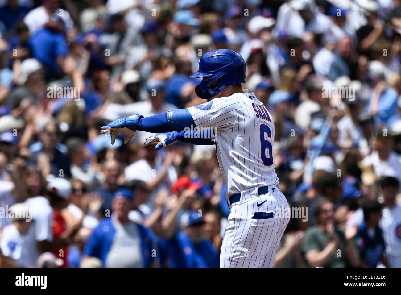 Chicago Cubs' Matt Shaw points after hitting a three-run home run ...