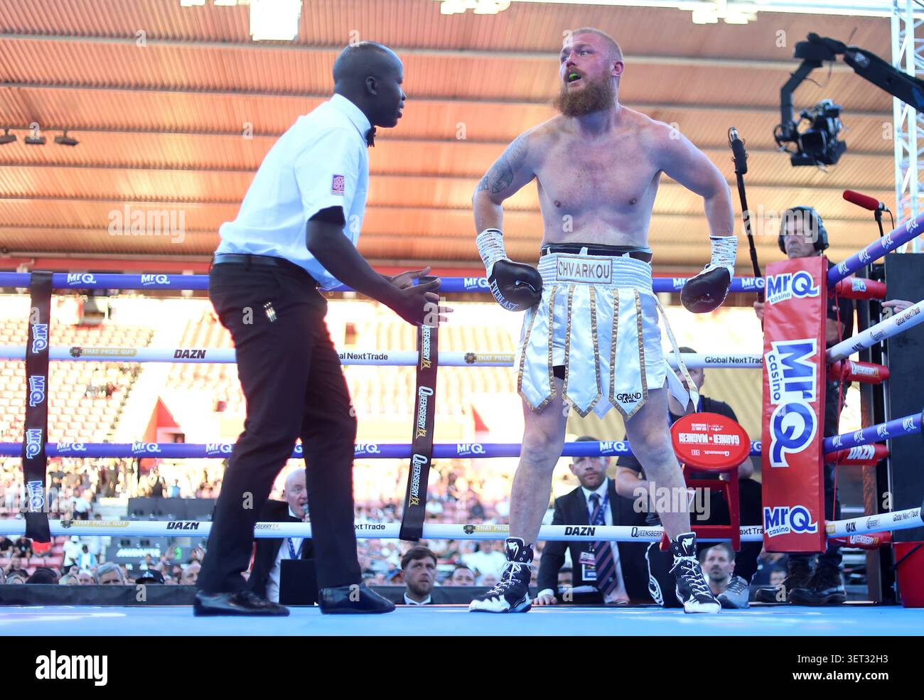 Viktar Chvarkou attempts to get up from the floor in the heavyweight ...
