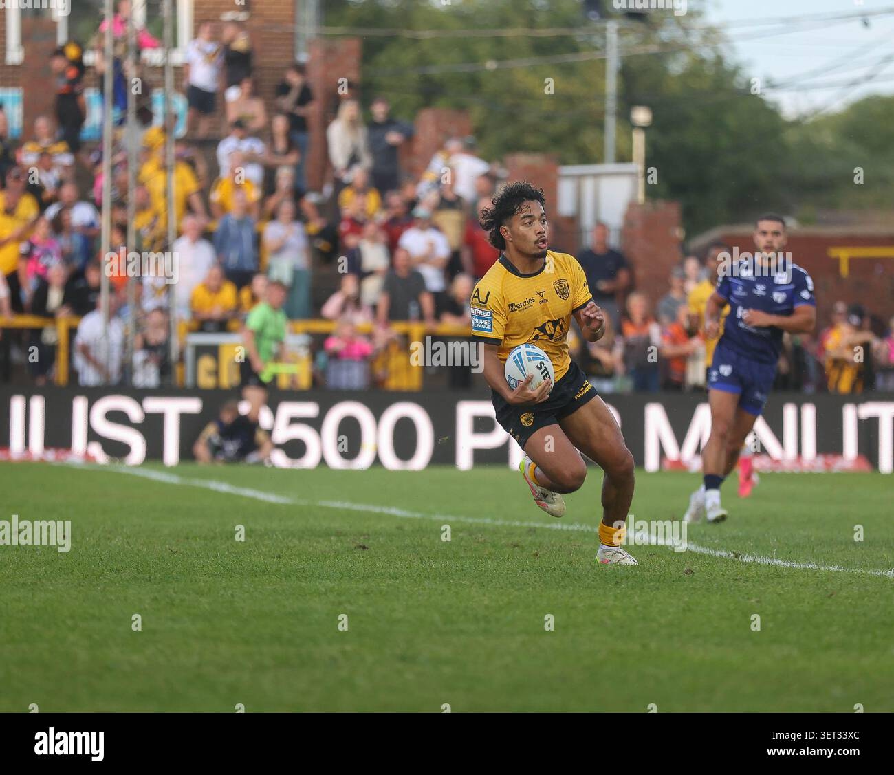 Phoenix Laulu-Togaga’e runs with the ball during the BetFred Super ...