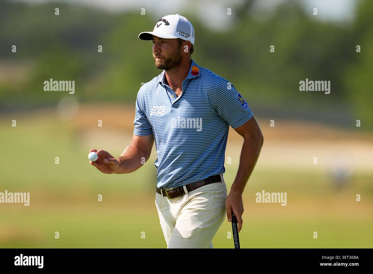Sam Burns waves after his putt on the fourth hole during the third ...