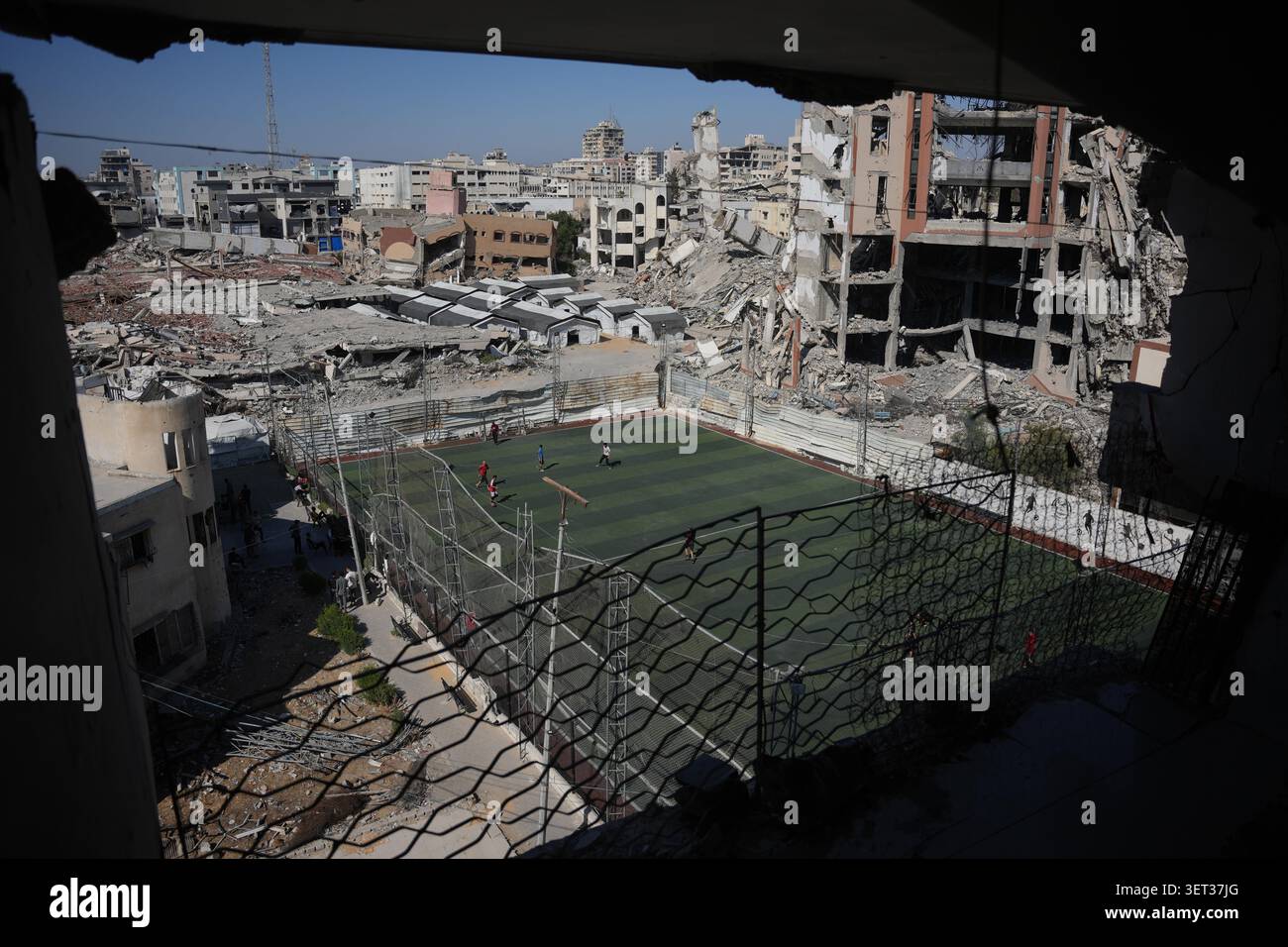 Displaced Palestinians play at the soccer club in Gaza City, Saturday ...