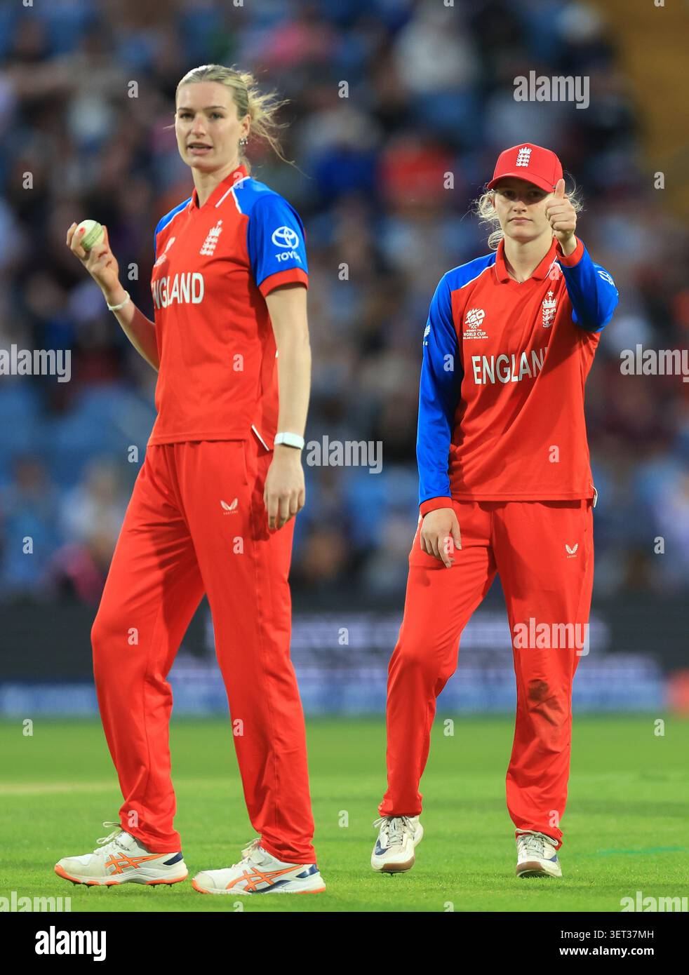 England's Charlie Dean (right) reacts to the camera as Lauren Bell ...
