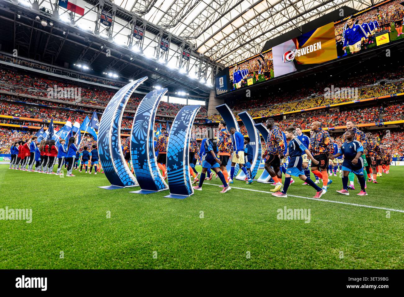 HOUSTON - The players walk to the center circle for the national ...