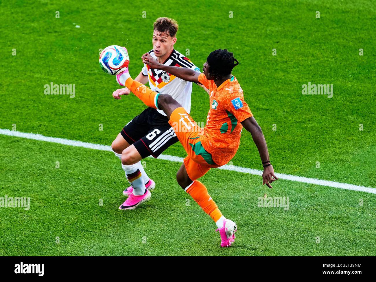 Ivory Coast's Yan Diomande (11) plays the ball in front of Germany's ...