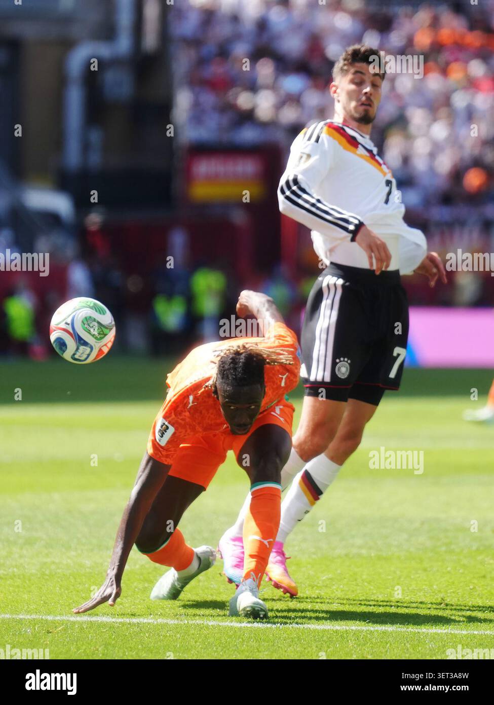 Germany's Kai Havertz (7) watches his header over Ivory Coast's Odilon ...