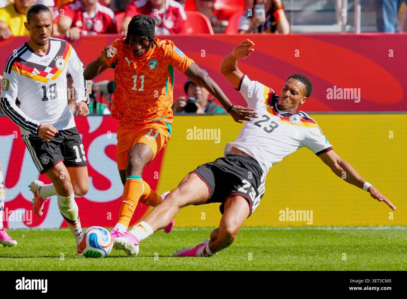 Ivory Coast's Yan Diomande (11) and Germany's Felix Nmecha (23) vie for ...