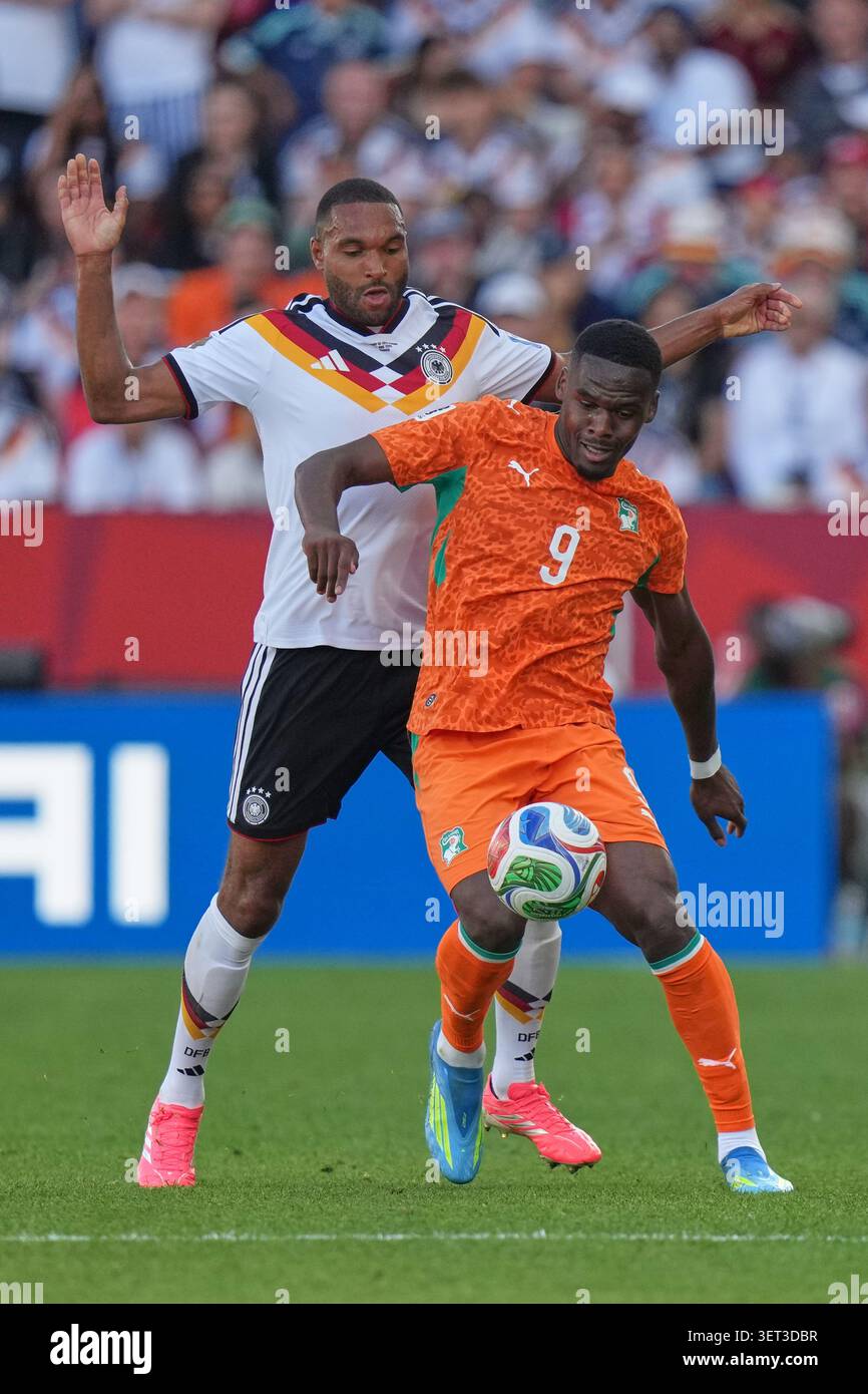 Germany's Jonathan Tah, at rear, challenges Ivory Coast's Ange-Yoan ...