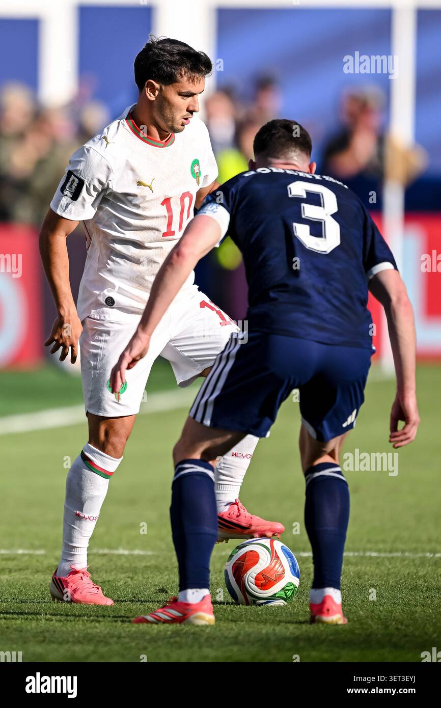 Brahim Diaz (Morocco) and Andy Robertson (Scotland) battle for the ball ...