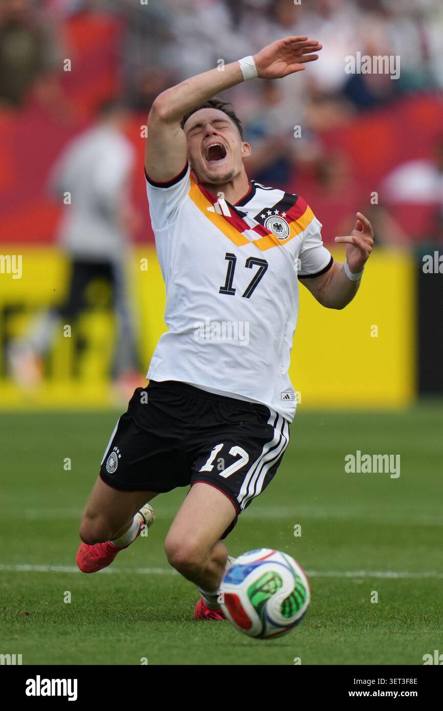 Germany's Florian Wirtz reacts as he is fouled during the World Cup ...