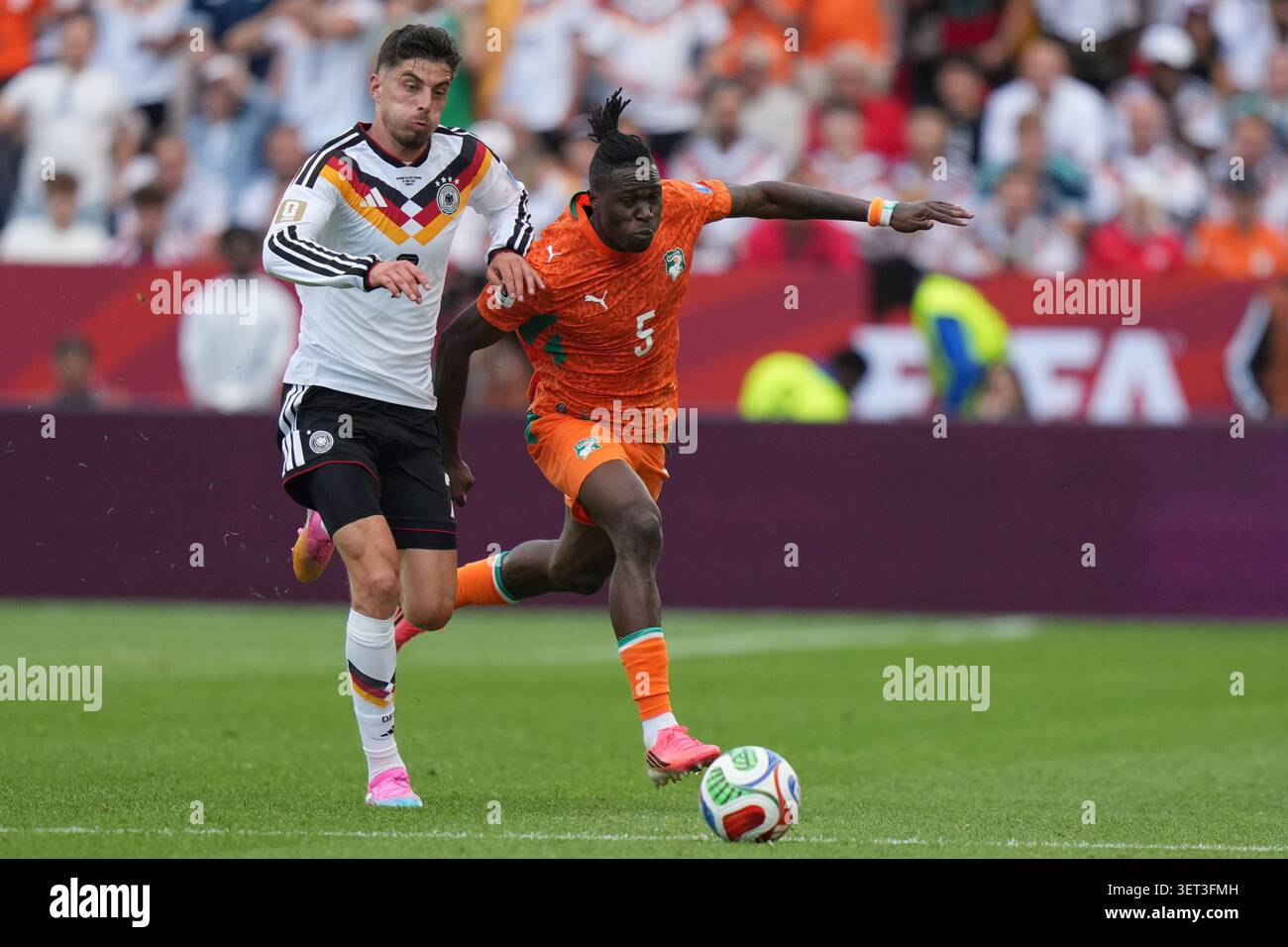 Germany's Kai Havertz left vies for the ball with Ivory Coast's ...