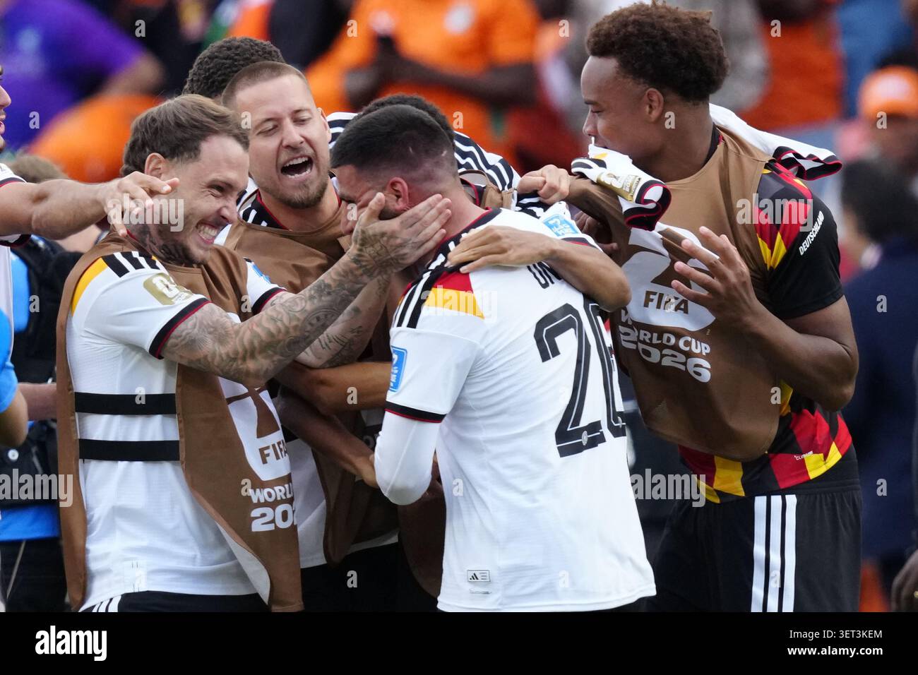 Germany's Deniz Undav (26) is mobbed by teammates after scoring their ...