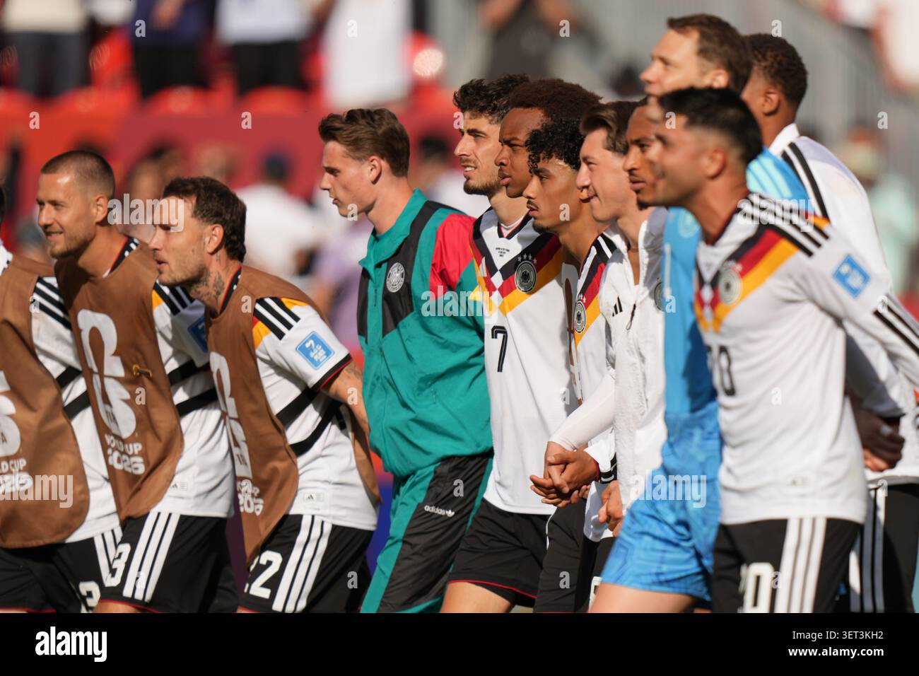 The German team celebrate after the end of the World Cup Group E soccer ...