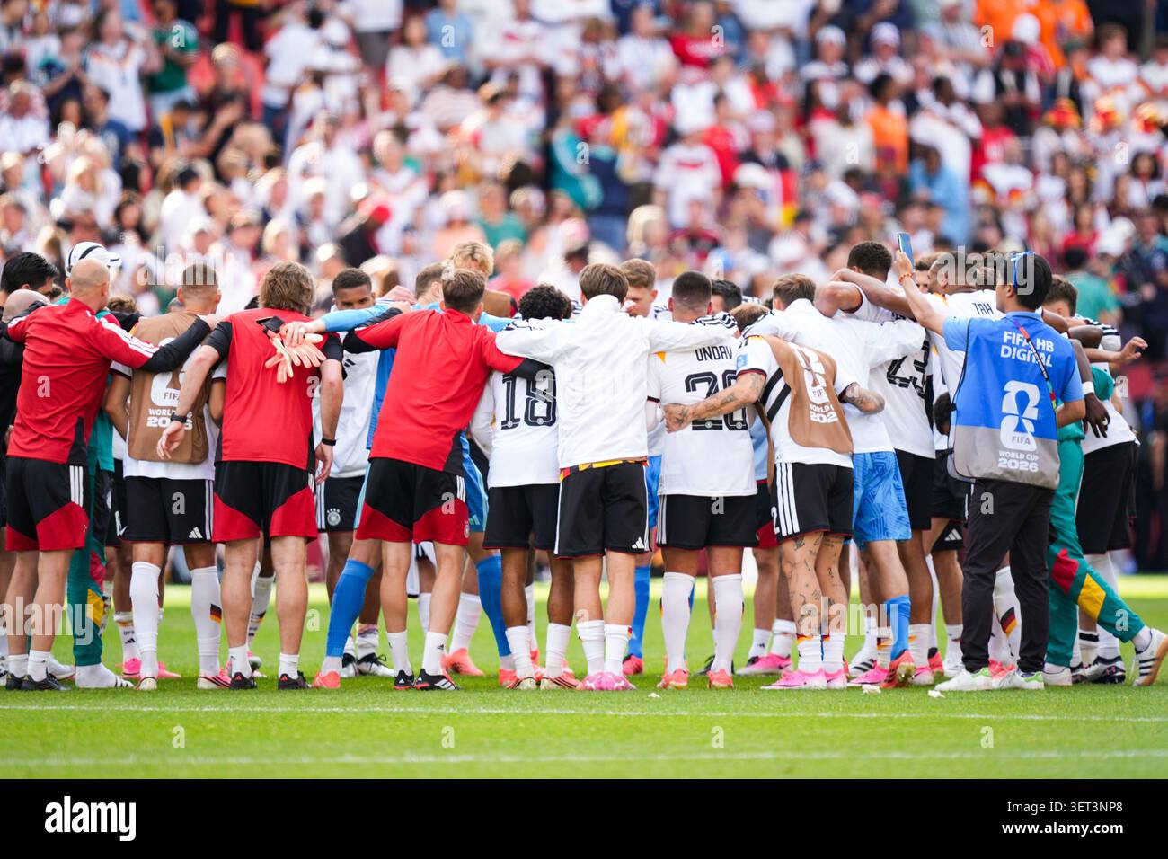 The Germany team gathers to celebrate a win over Ivory Coast during a ...