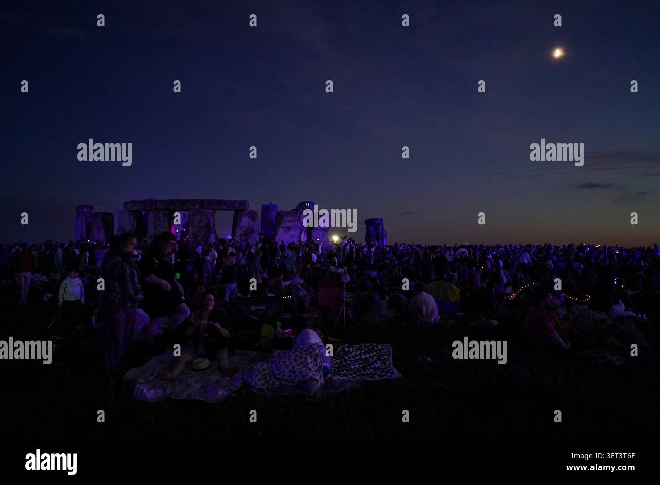 Revelers gather at the ancient stone circle Stonehenge to celebrate the ...