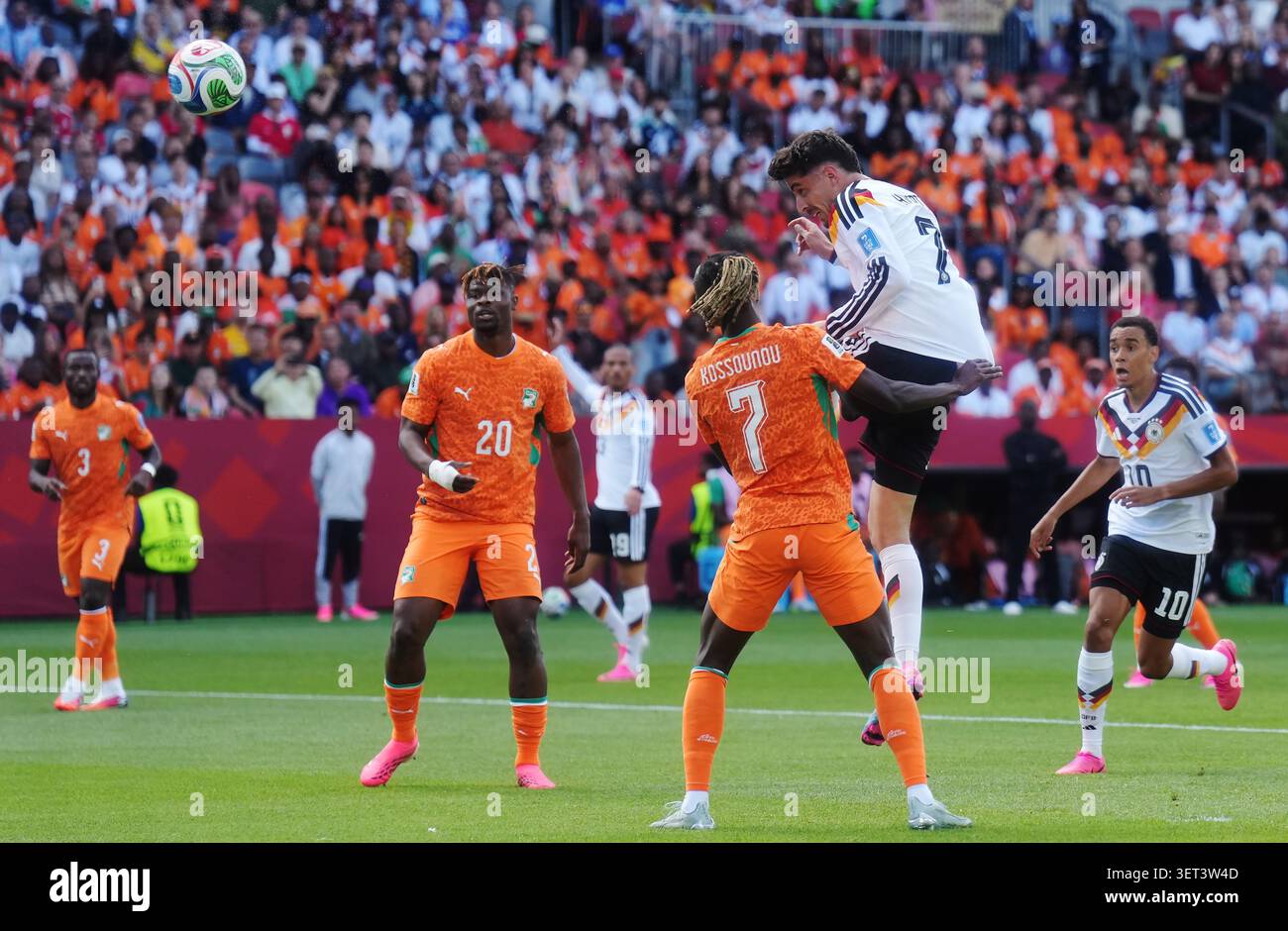 Germany's Kai Havertz (top) heads the ball over Ivory Coast's Odilon ...