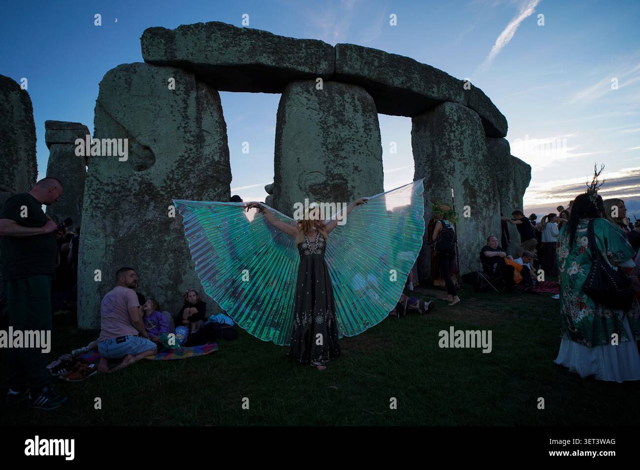 Revelers gather at the ancient stone circle Stonehenge to celebrate the ...