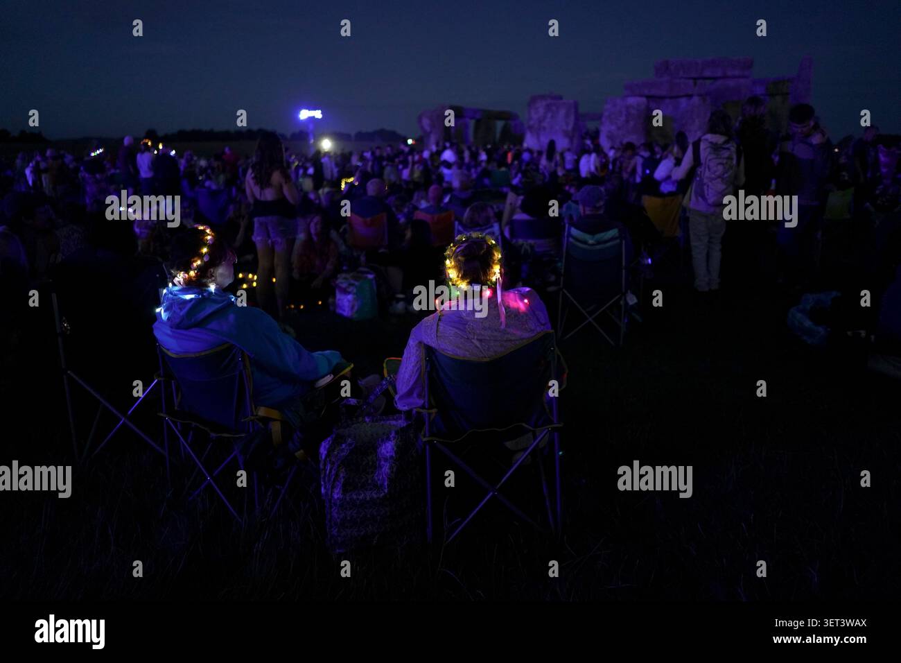 Revelers gather at the ancient stone circle Stonehenge to celebrate the ...