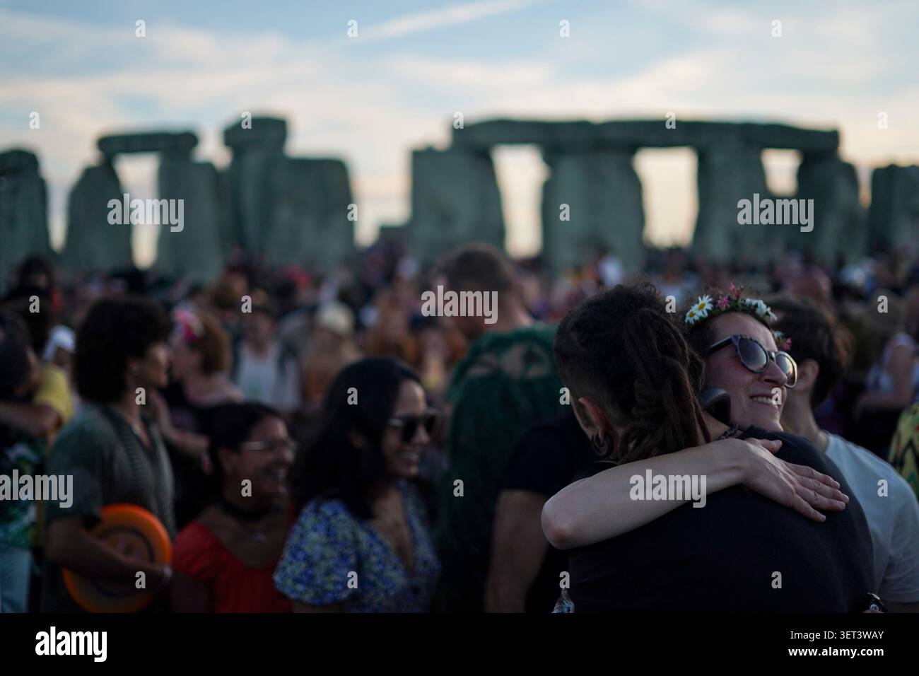 Revelers gather at the ancient stone circle Stonehenge to celebrate the ...