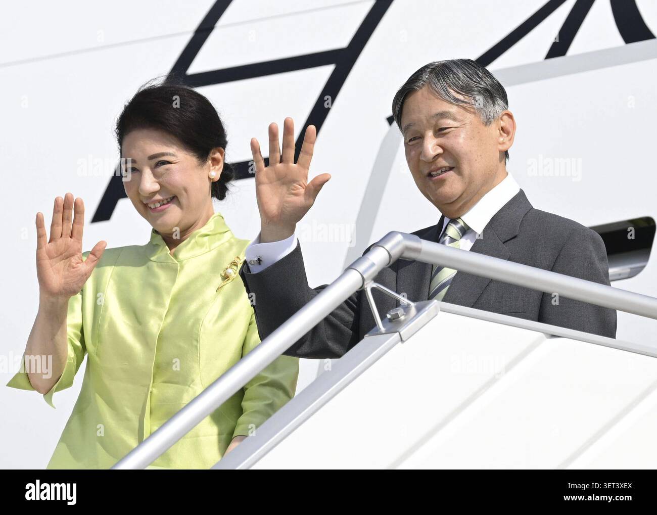 Japan's Emperor Naruhito and Empress Masako wave at Schiphol airport on ...