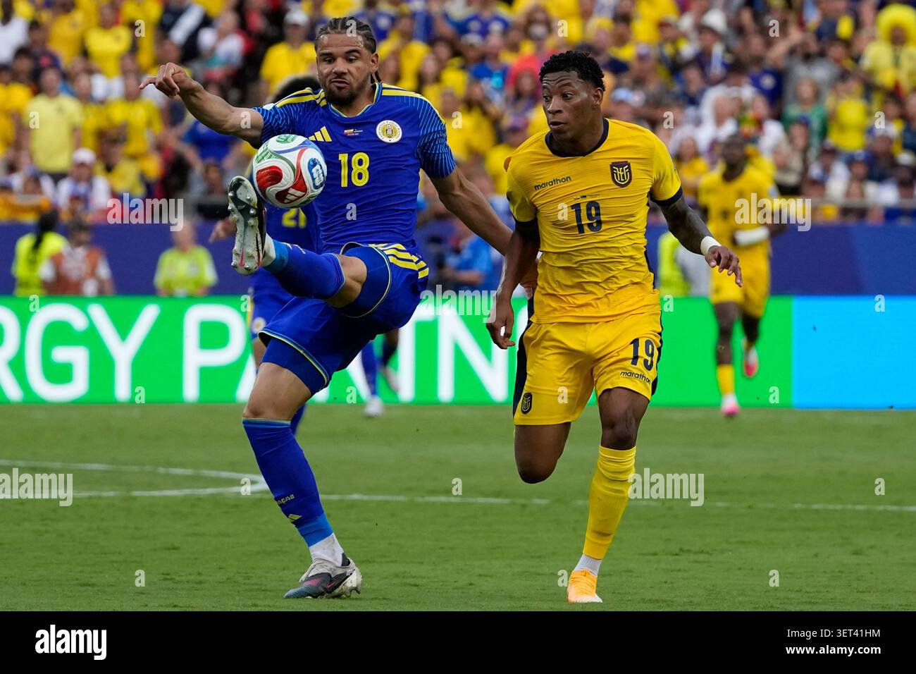 Curaçao's Armando Obispo, left, and Ecuador's Gonzalo Plata battle for ...