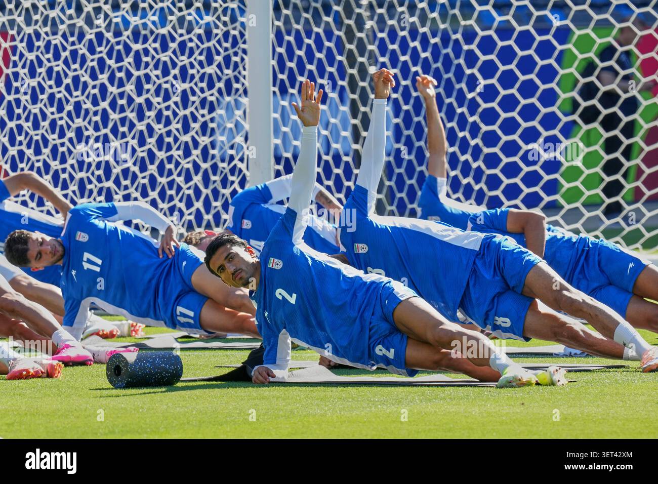 Iran's Saleh Hardani (2) and teammates exercise during a training ...
