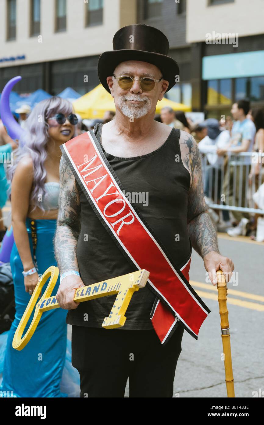 Revelers attend the annual Mermaid Parade at Coney Island on June 20 ...